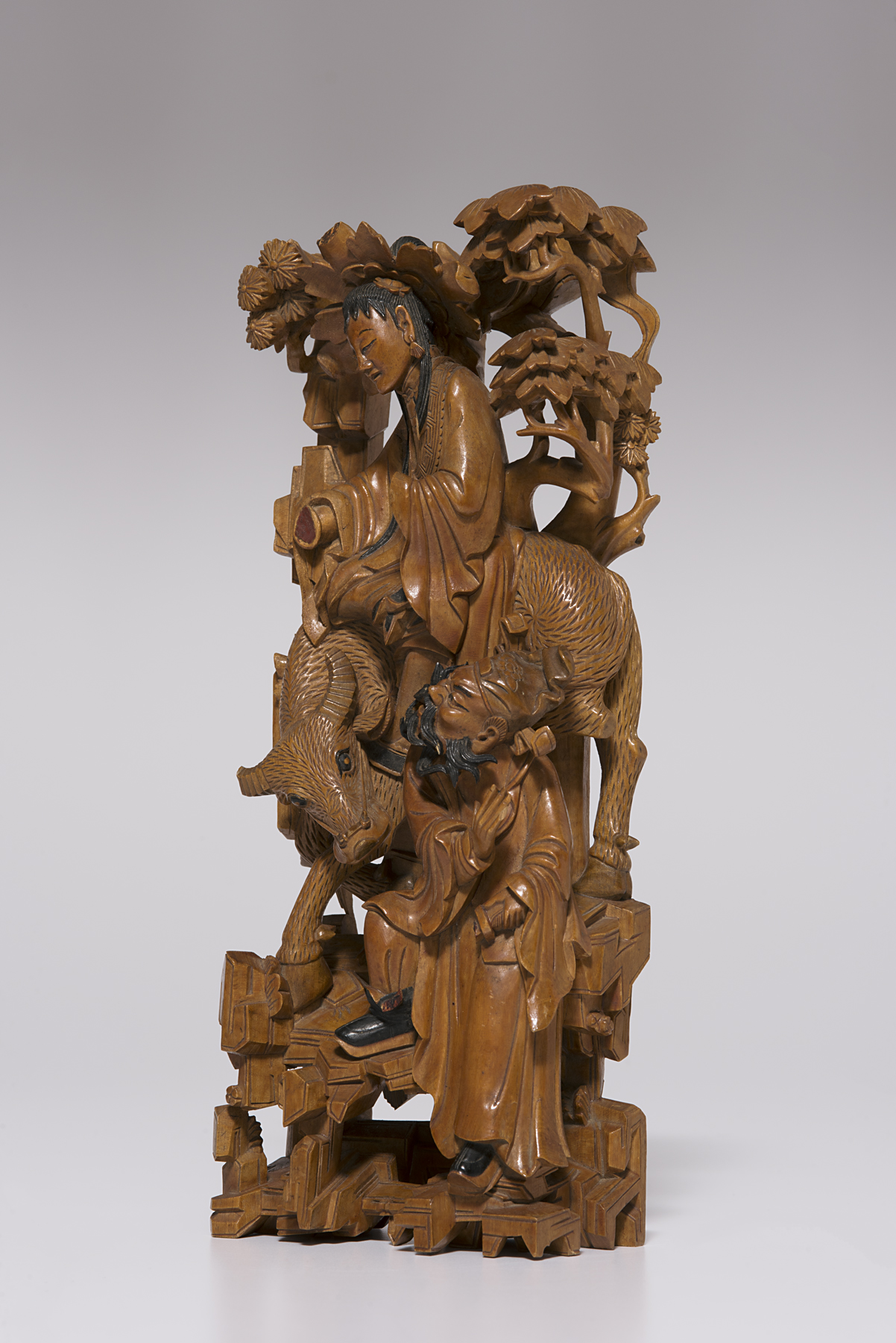 woman, ox and man carving | Spencer Museum of Art